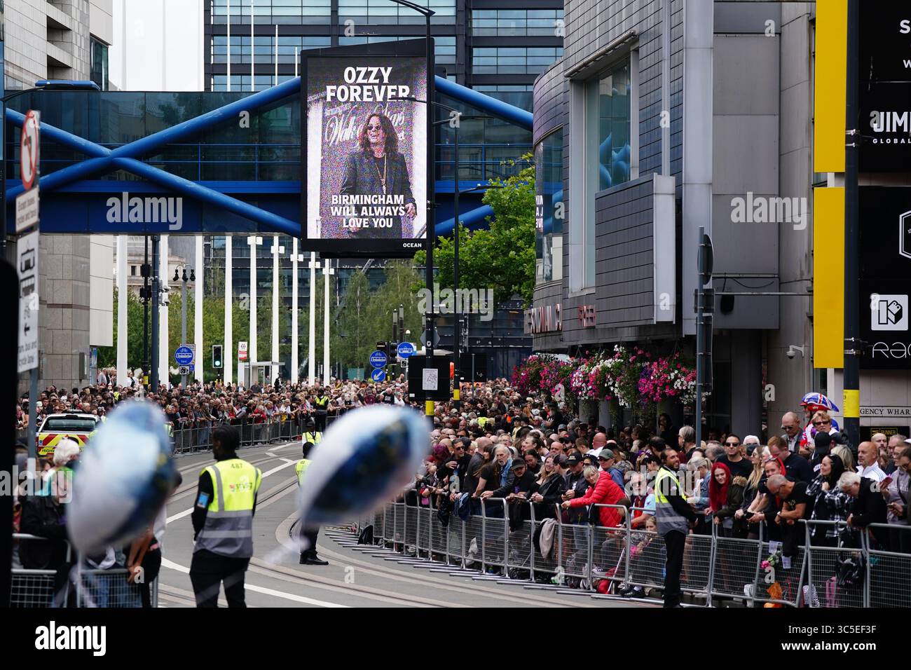 Fans on Broad Street in Birmingham in memory of Black Sabbath frontman ...