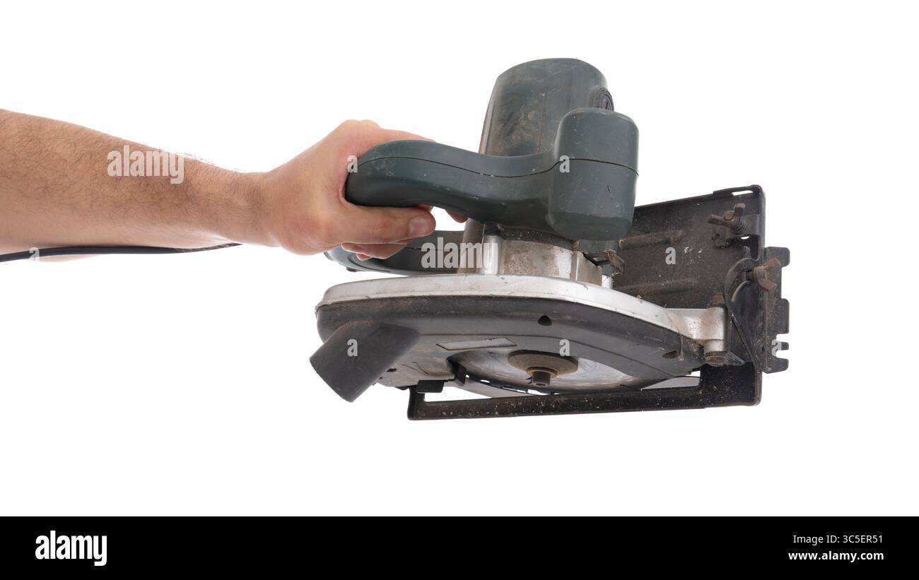 Hand holding a circular saw with precision grip Stock Photo - Alamy