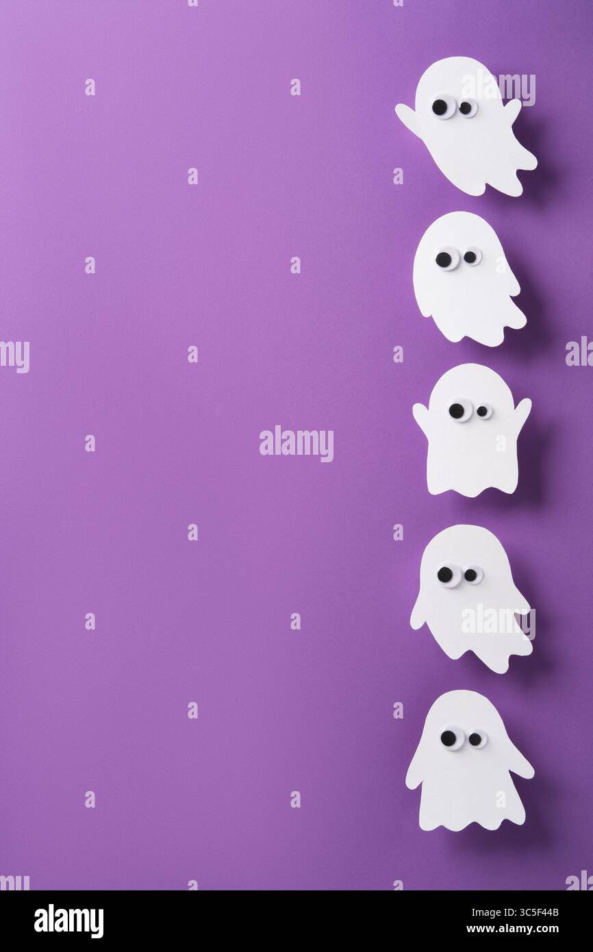 Charming white ghost figure with googly eyes on a purple background ...
