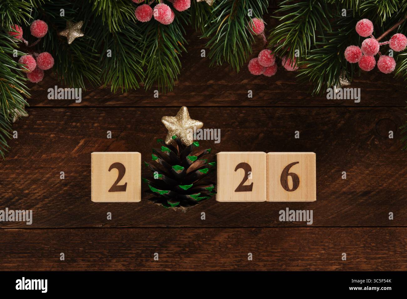Figures 2025 New Year wooden blocks with fir branches, red Christmas ...