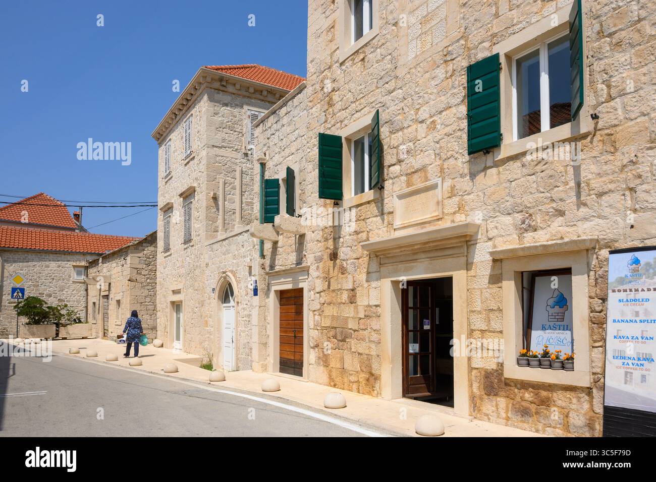 Brac, Croatia - June 10, 2025: Traditional architecture of Pucisca town ...