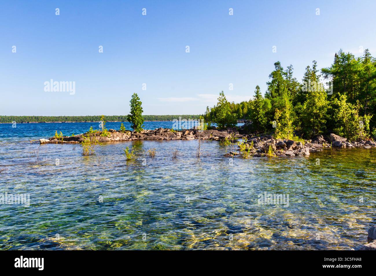 Wild rocky shoreline of Bruce Peninsula National Park near Little Dunks ...