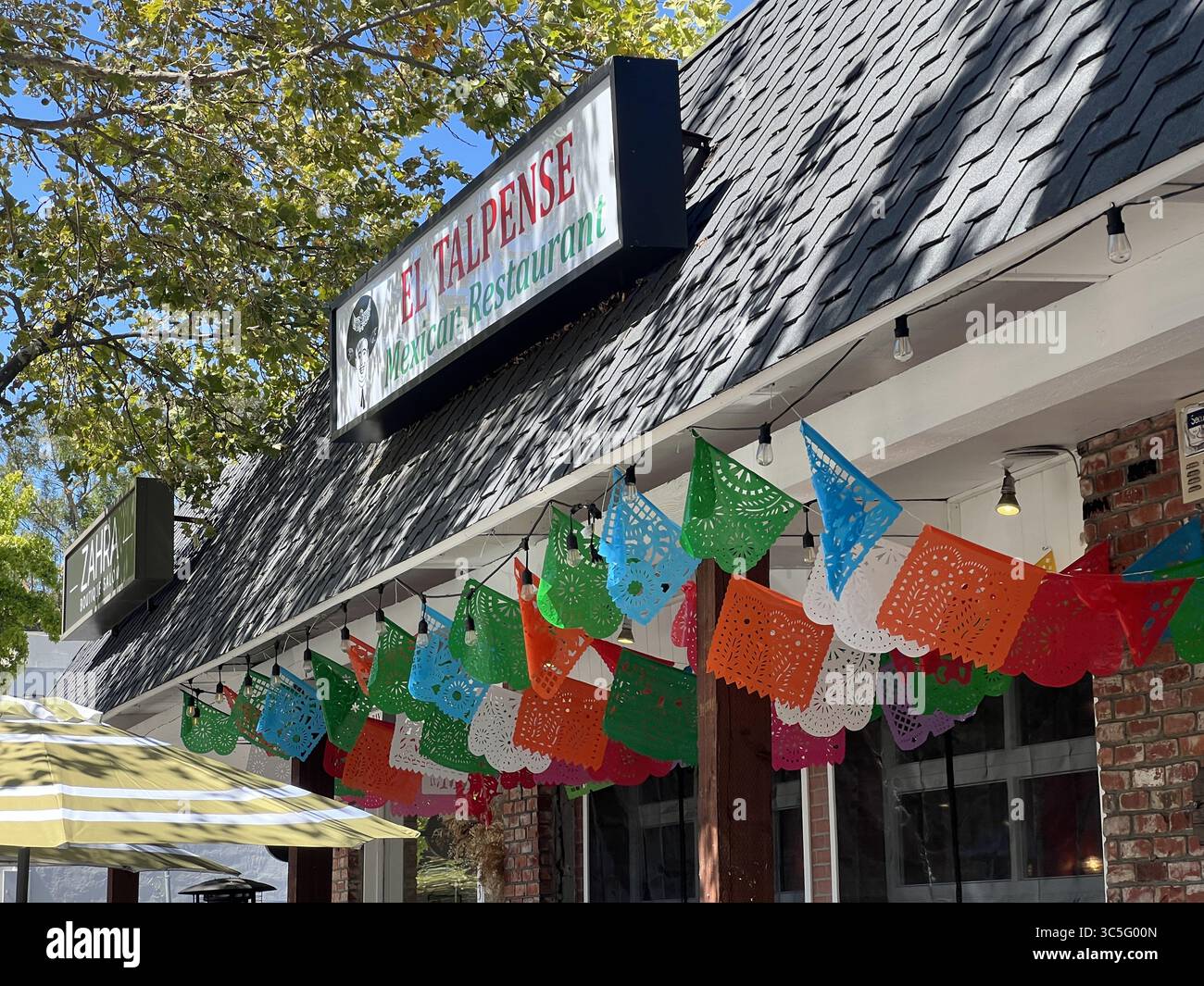Colorful exterior of El Talpense Mexican Restaurant with decorative ...