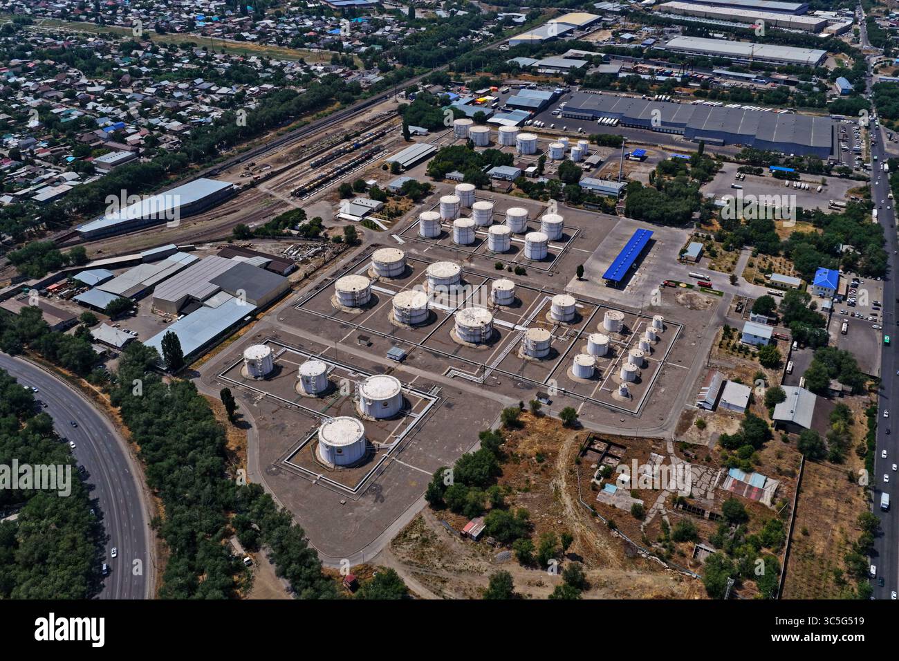 An oil depot with large tanks of various fuels. The view from the drone ...