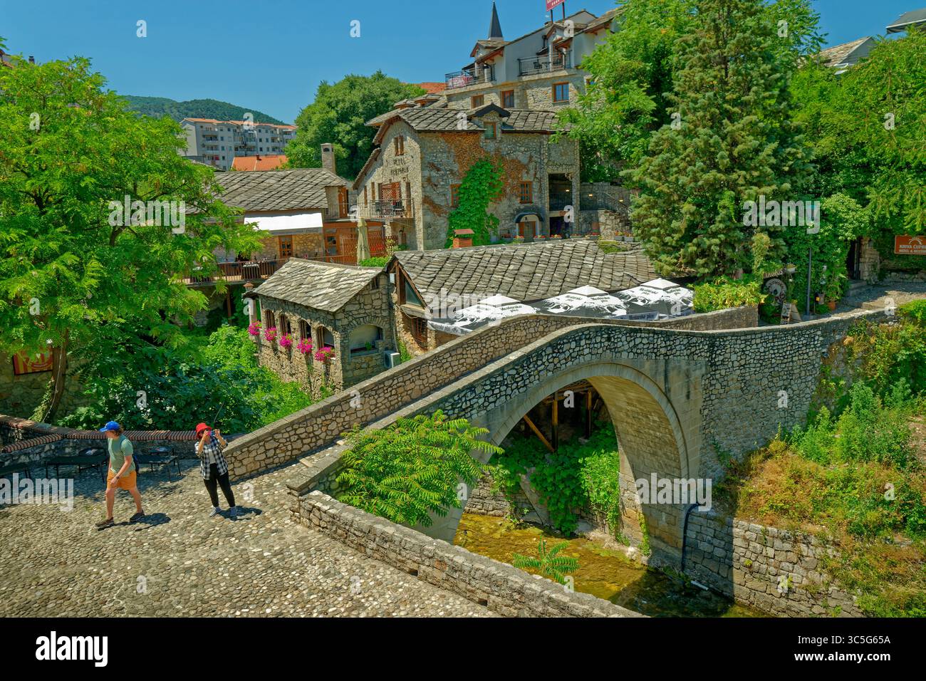 The old town area and 'Crooked Bridge' at Mostar in Bosnia and ...