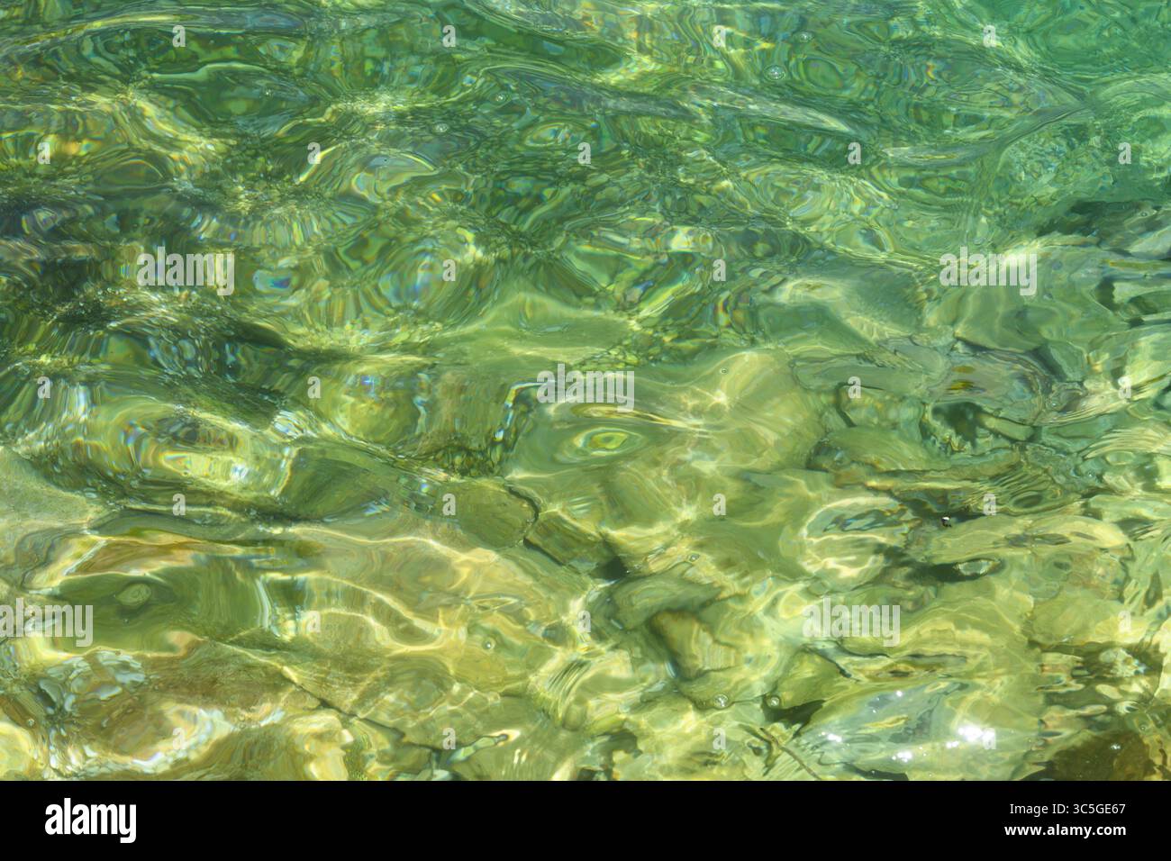 Surface of the sea. Natural texture of sea water. Emerald ocean water ...