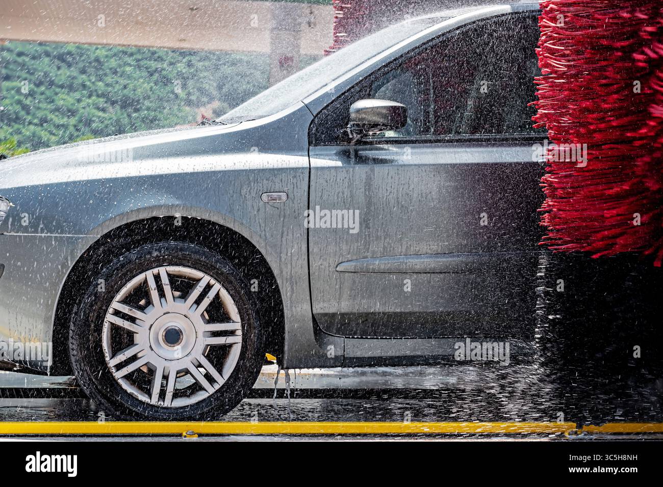 vehicle during washing in an automatic car wash machine Stock Photo - Alamy