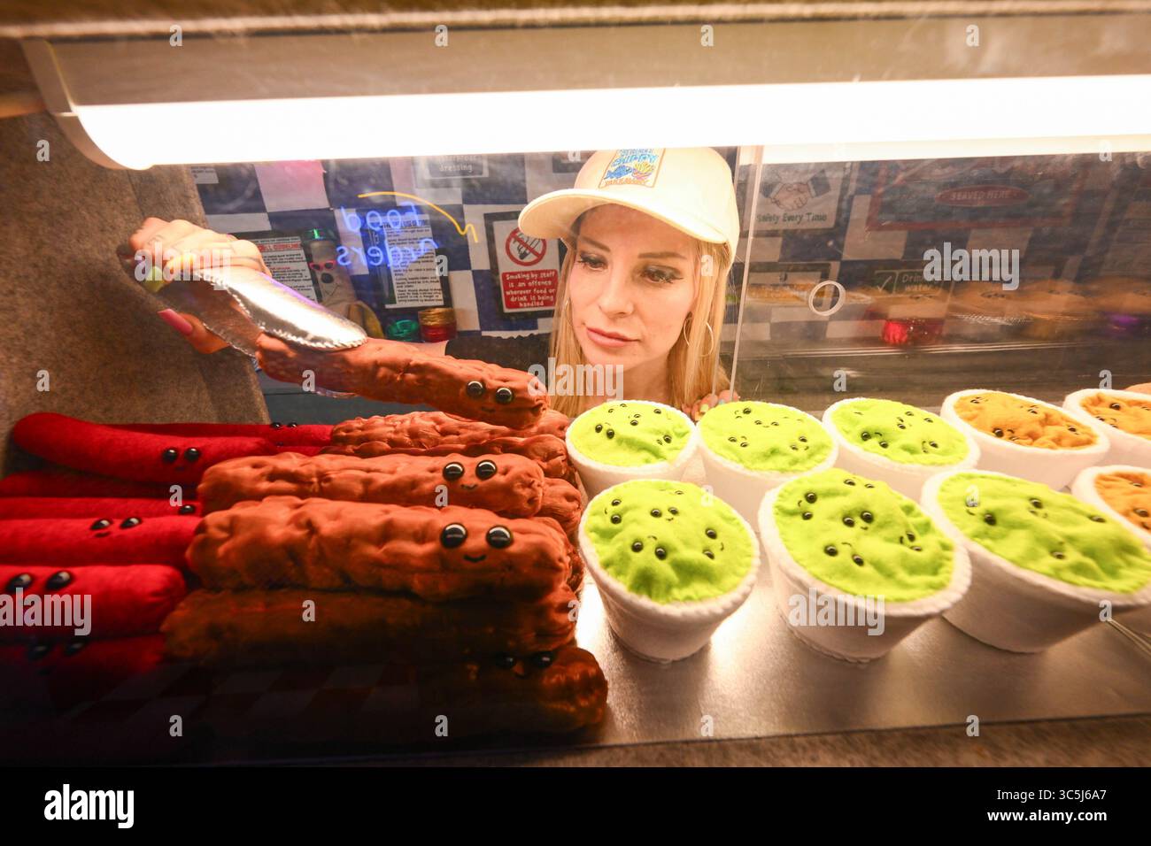 EDITORIAL USE ONLY Artist Lucy Sparrow at The Bourdon Street Chippy ...
