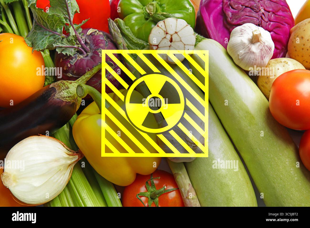 Fresh vegetables and radioactive sign. Environmental contamination ...