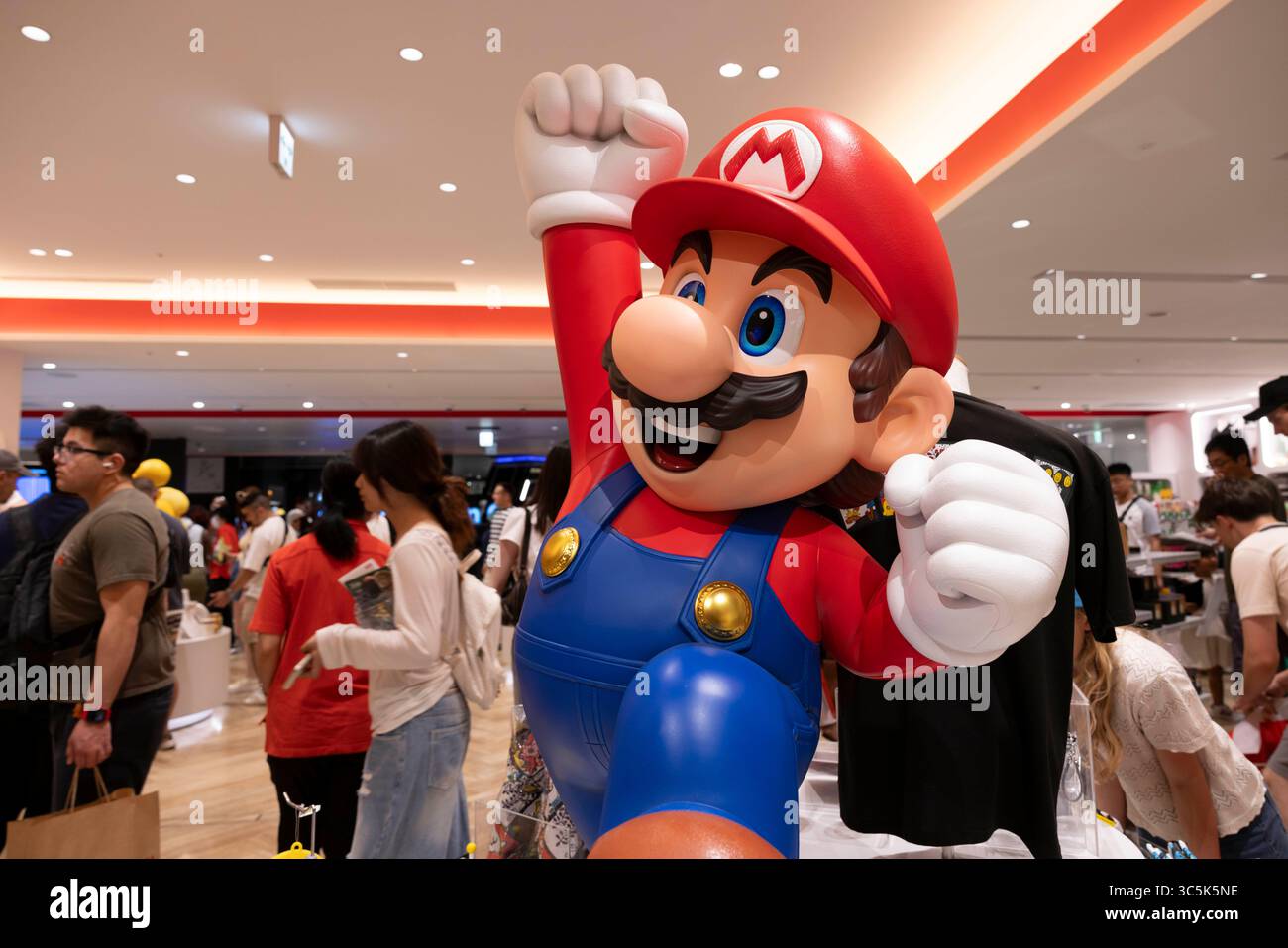 A Super Mario statue is seen inside a Nintendo store in Shibuya. Video ...