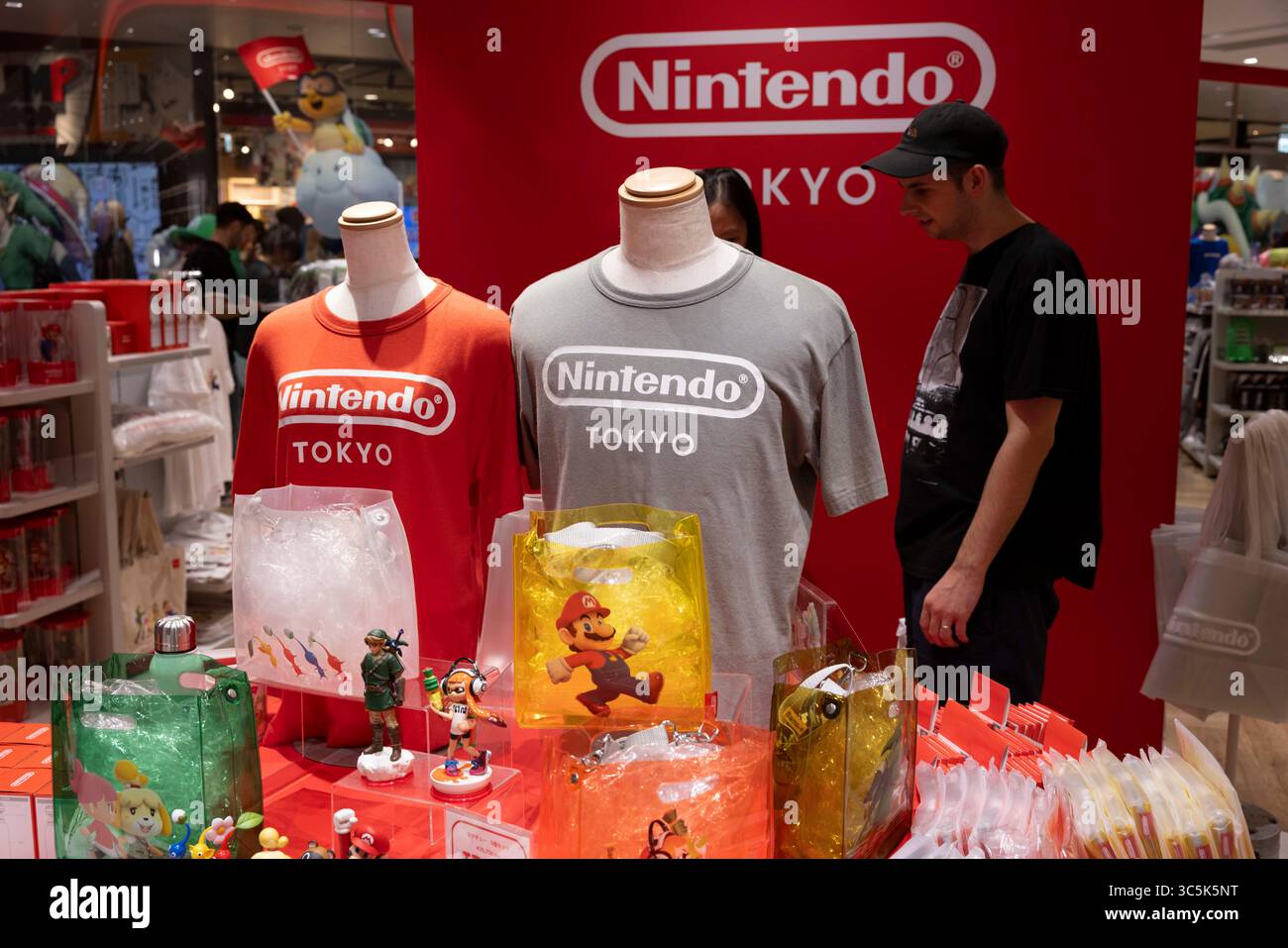 Visitors inside Nintendo store in Shibuya look at the merchandise on ...