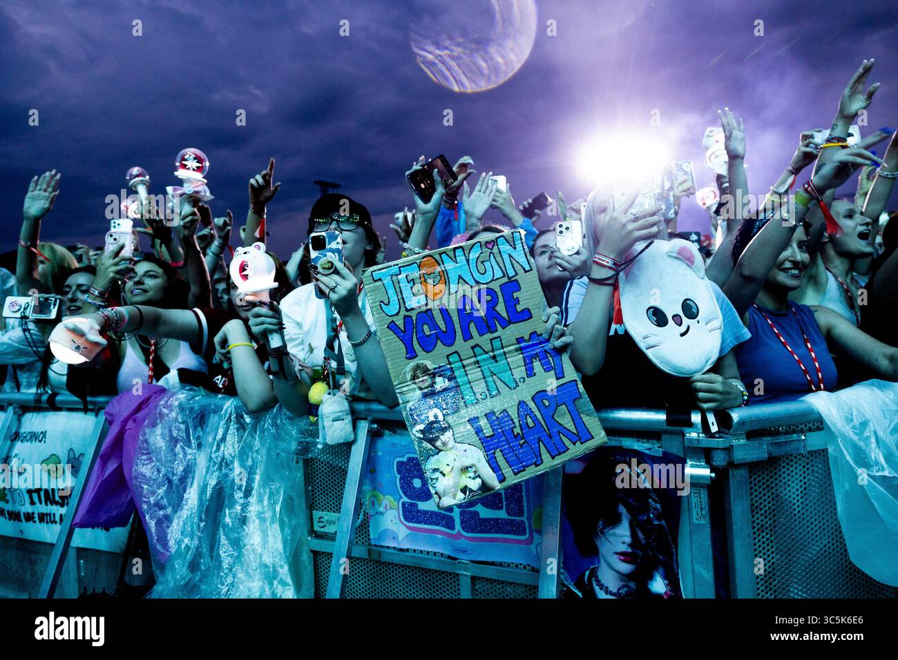 Audience show a sign dedicated to the band during from South Korean boy ...