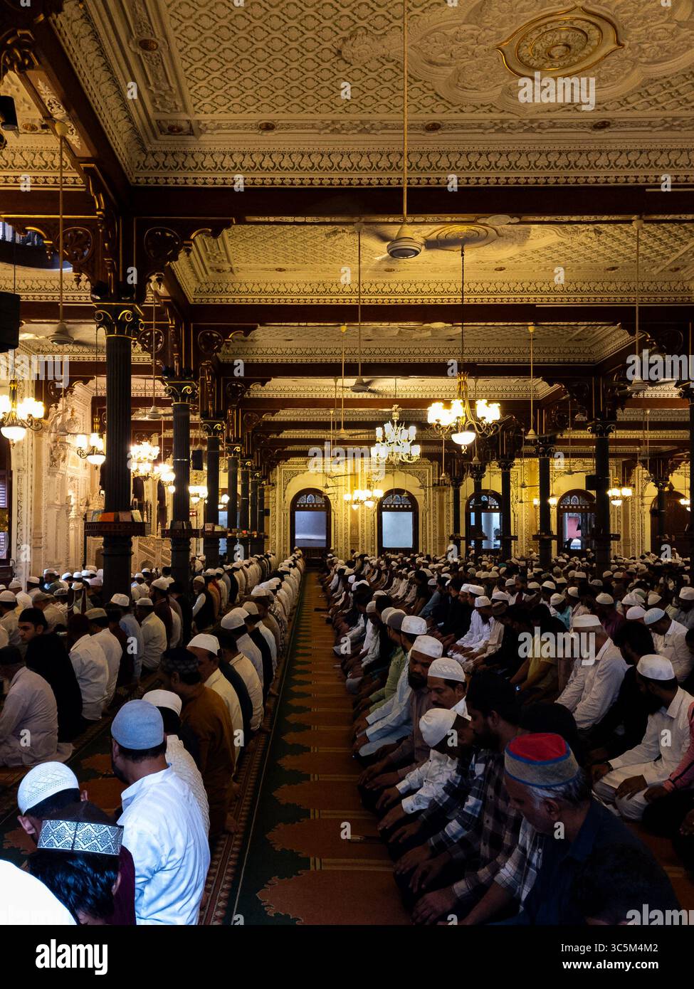 Muslim men line up in prayer during Jummah at Juma Masjid, Mumbai ...