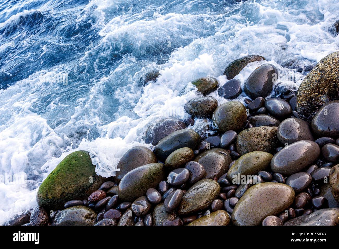 Running water onto pebbles hi-res stock photography and images - Alamy