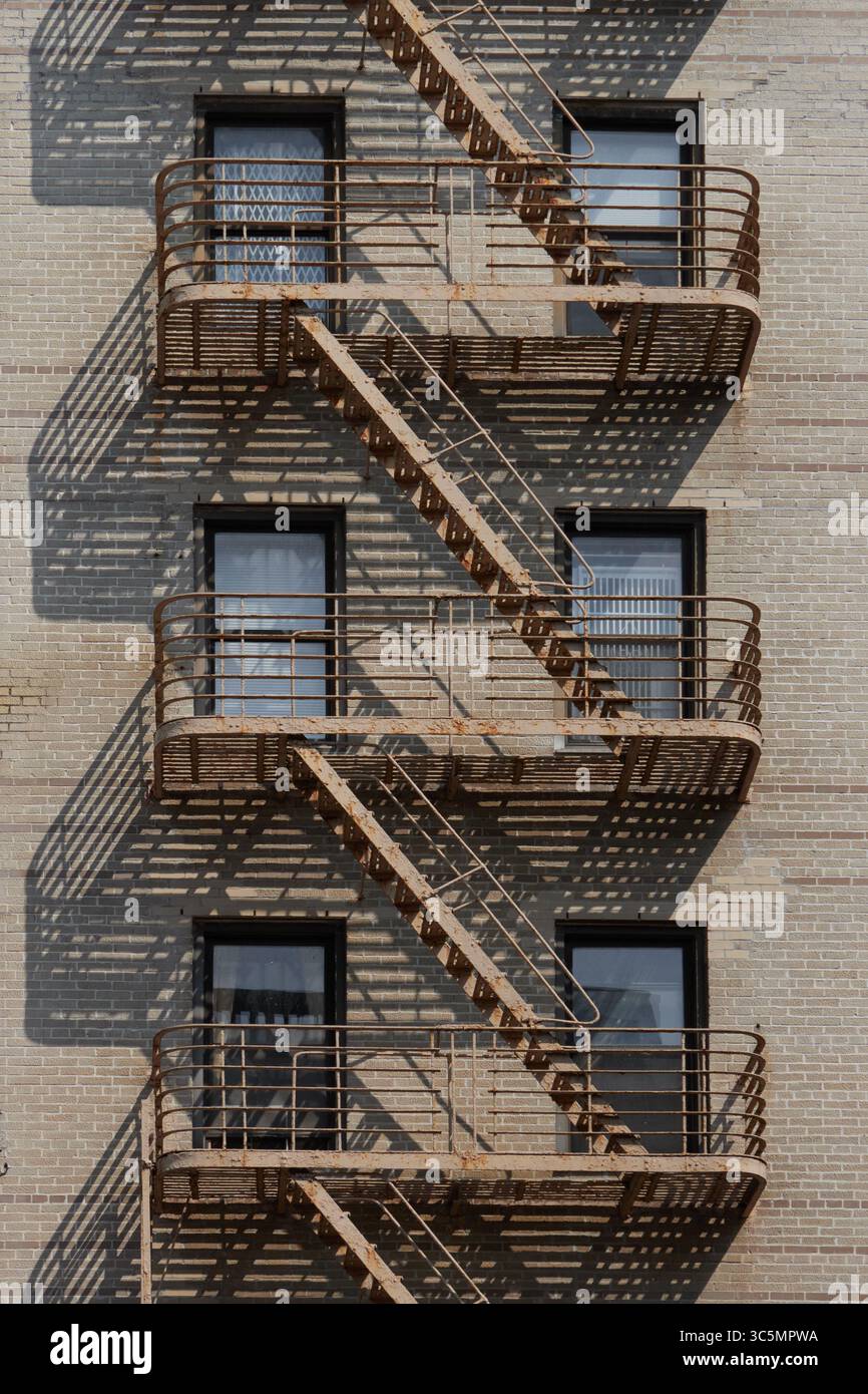 external fire escape of a residential brick apartment building, art ...