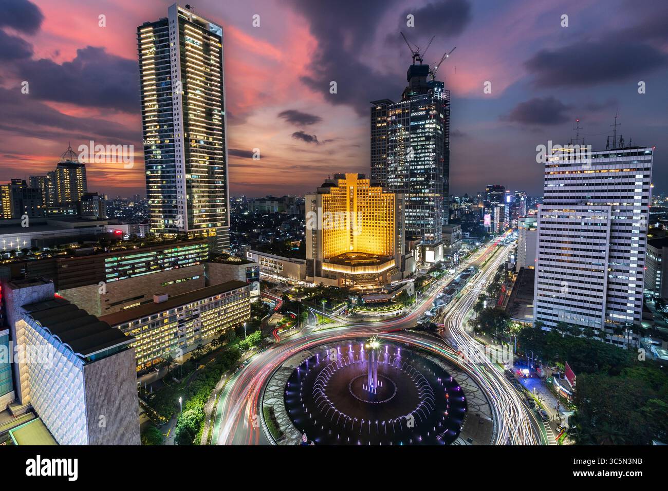 Jakarta skyline taken in a fantastic blue hour, with the big roundabout ...