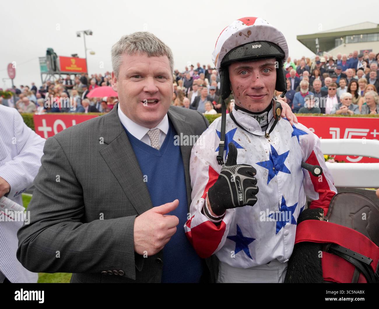 Jockey Danny Gilligan with trainer Gordon Elliott after winning the Tote Galway Plate at Galway ...