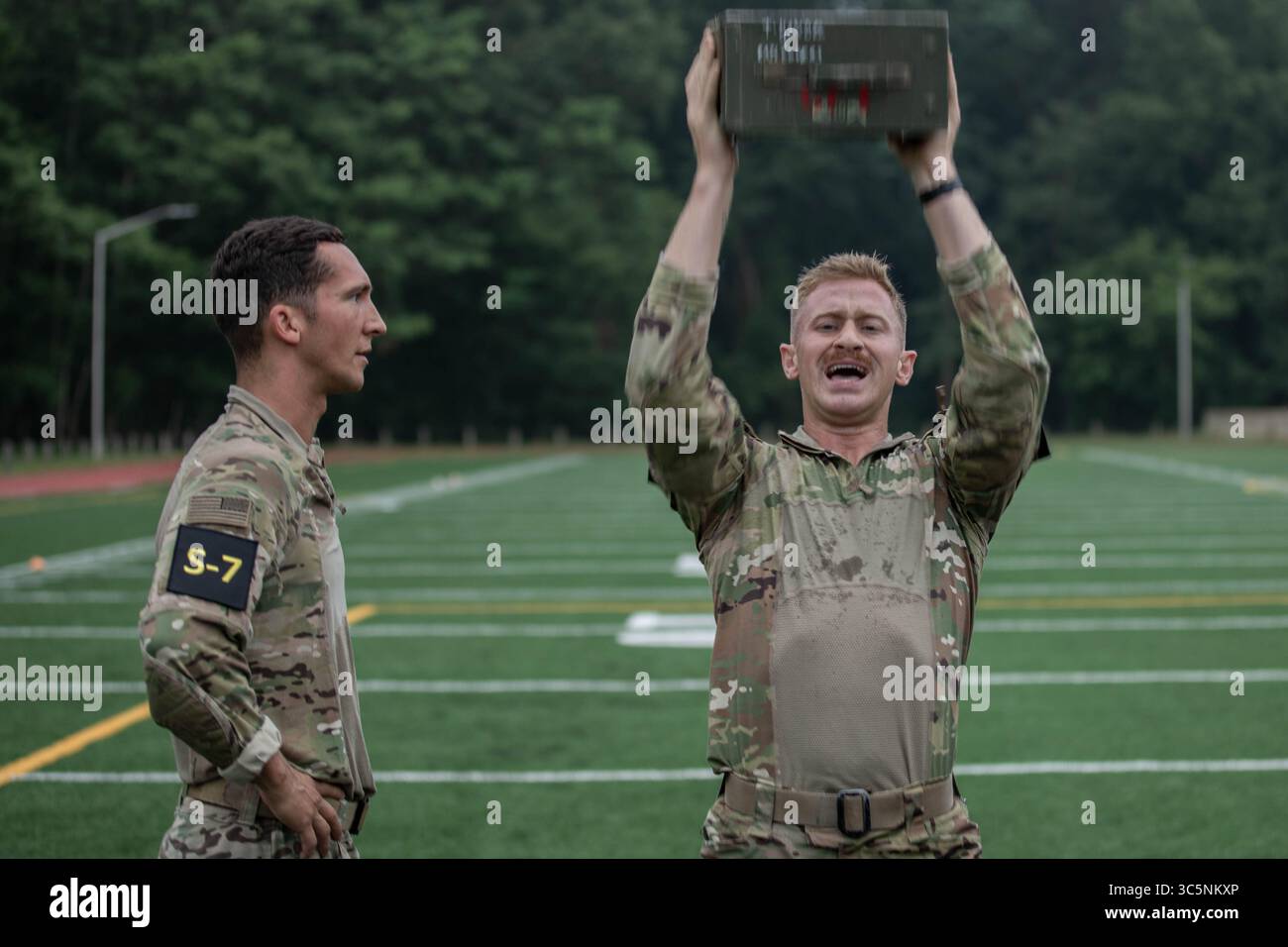 July 14, 2025 - USA - Sgt. Michael Fouts (left) counts repetitions for ...