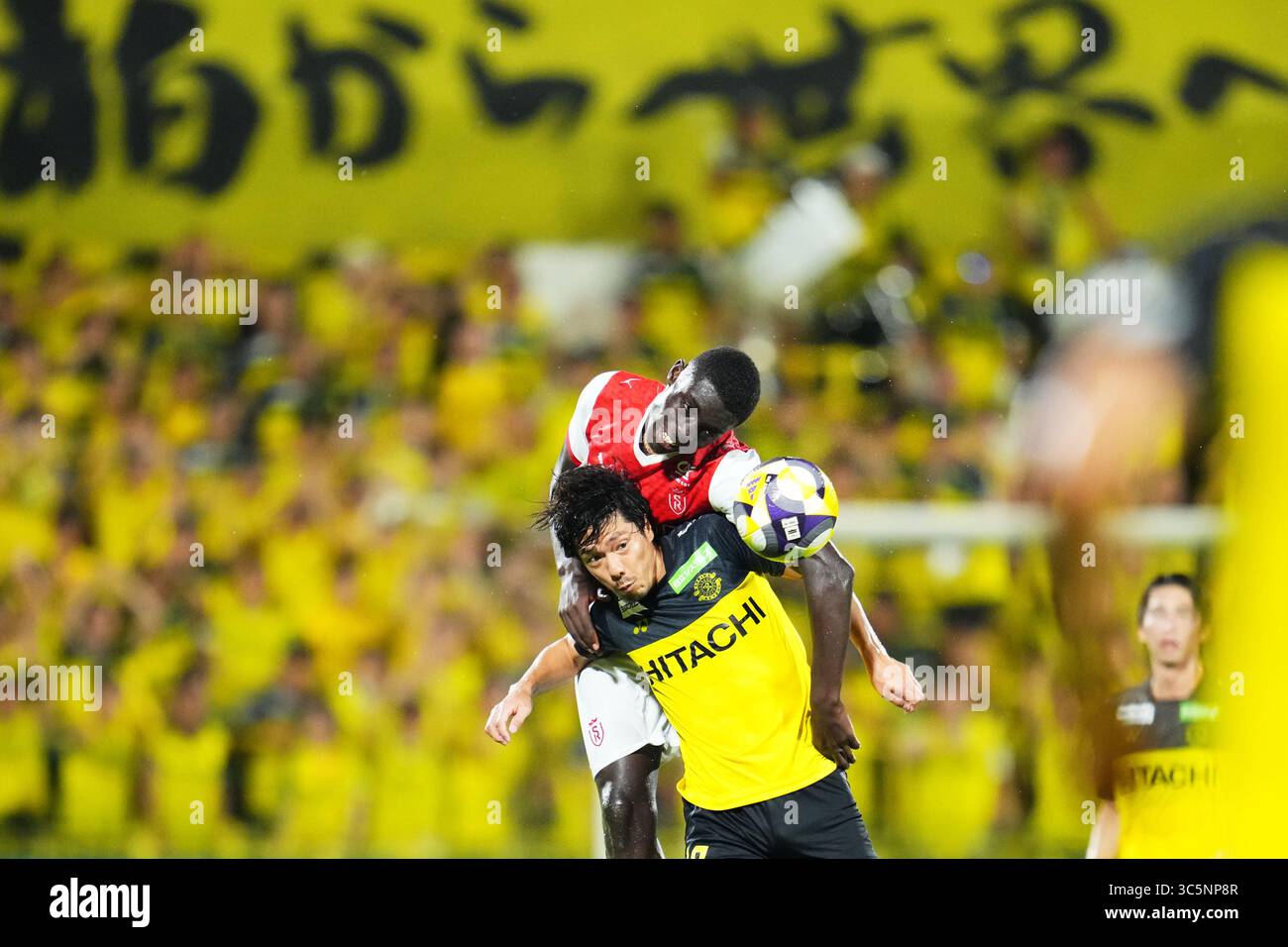 (Top-Bottom) Mohamed Ali Diadie (Reims), Hayato Nakama (Reysol), JULY ...