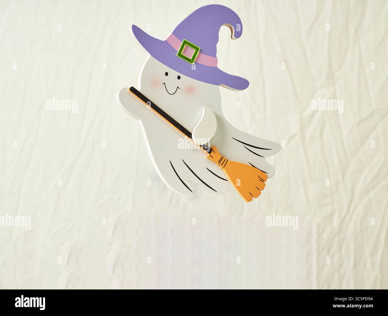A ghost riding on a witches broom! Stock Photo - Alamy