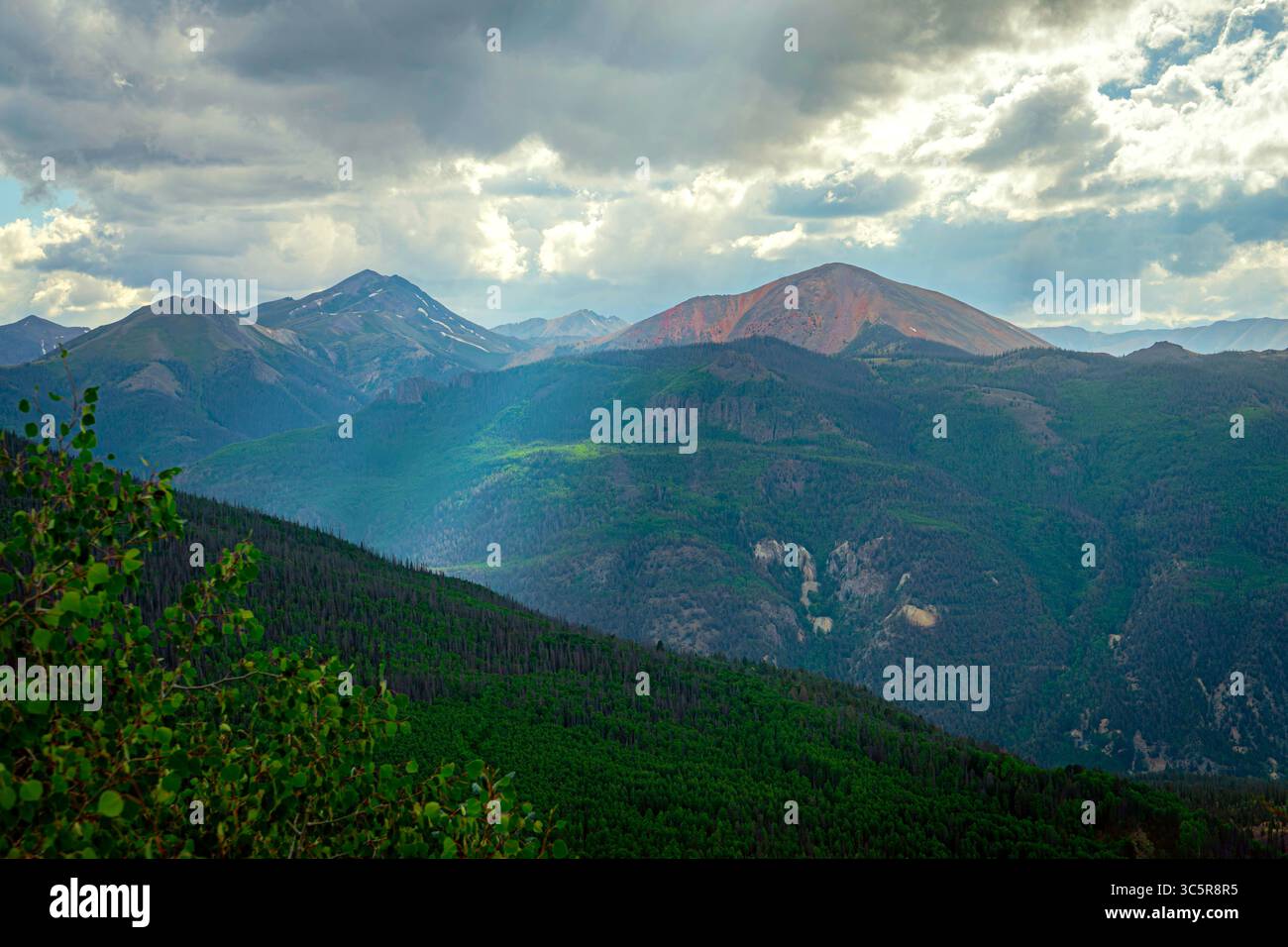 Rugged San Juan peaks near Lake City, Colorado, shine in moody post ...