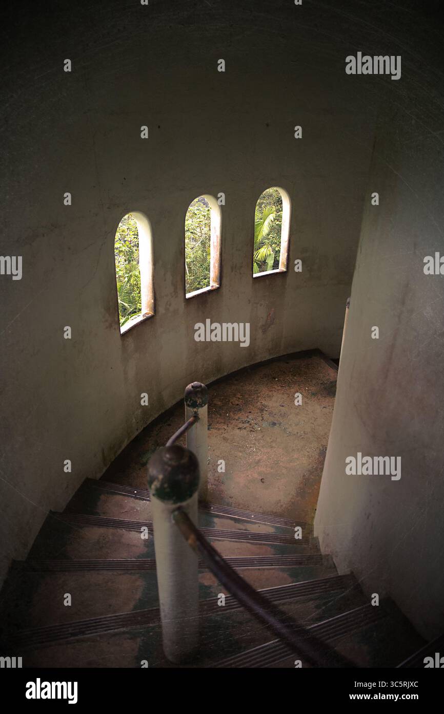 Hidden caribbean passageway with arched windows Stock Photo - Alamy
