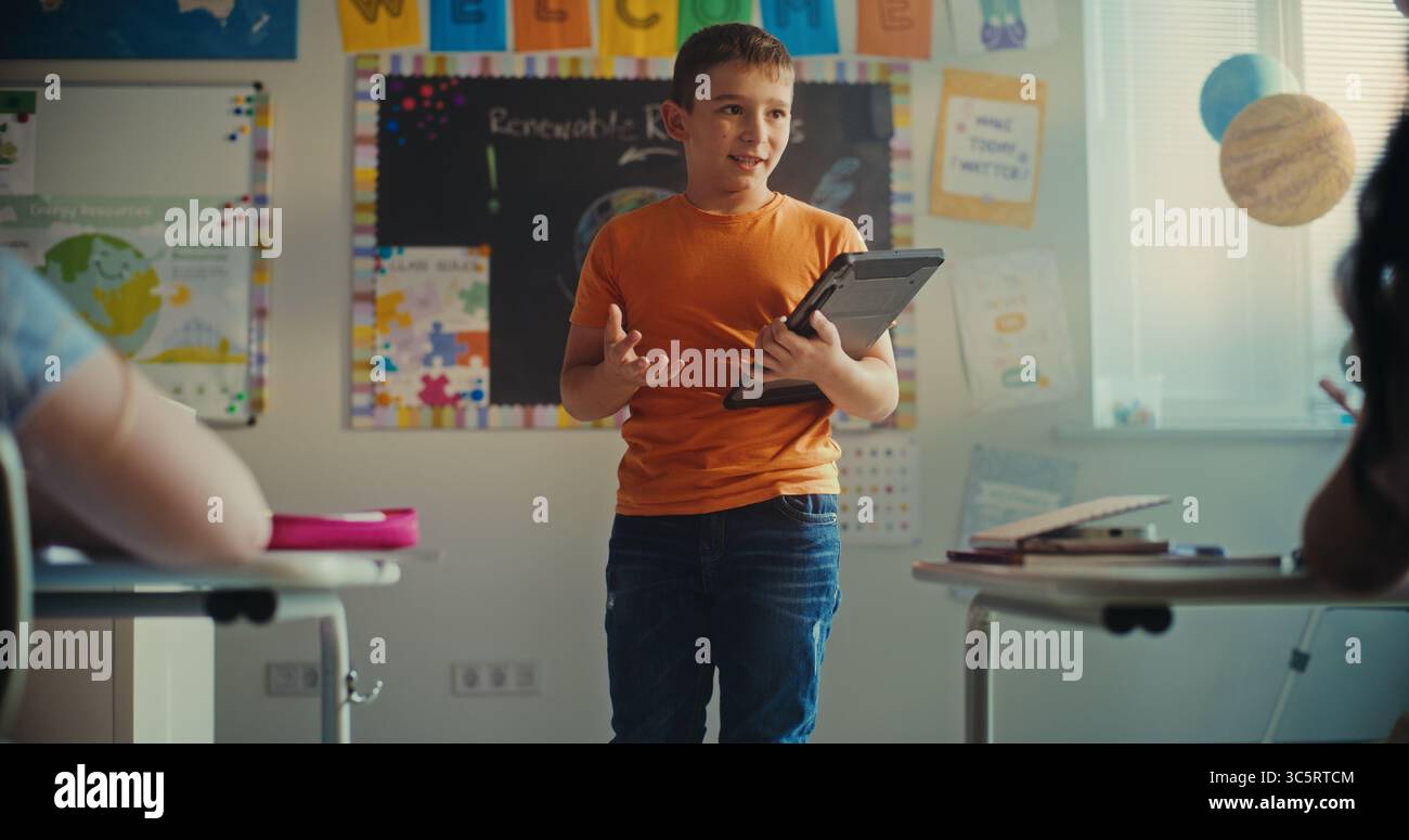 STEM Class on Renewable Energy: Elementary School Boy with Tablet ...