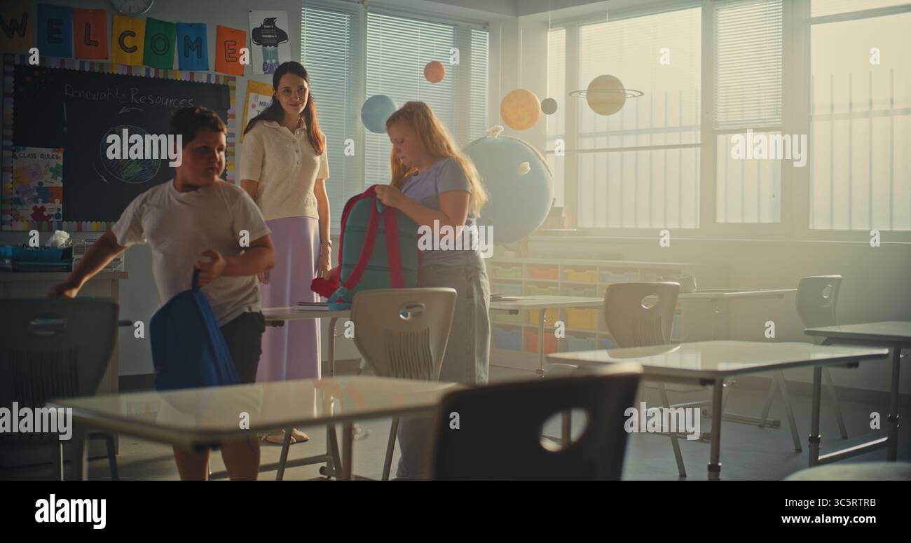 Female teacher finishing lesson announcing hi-res stock photography and ...