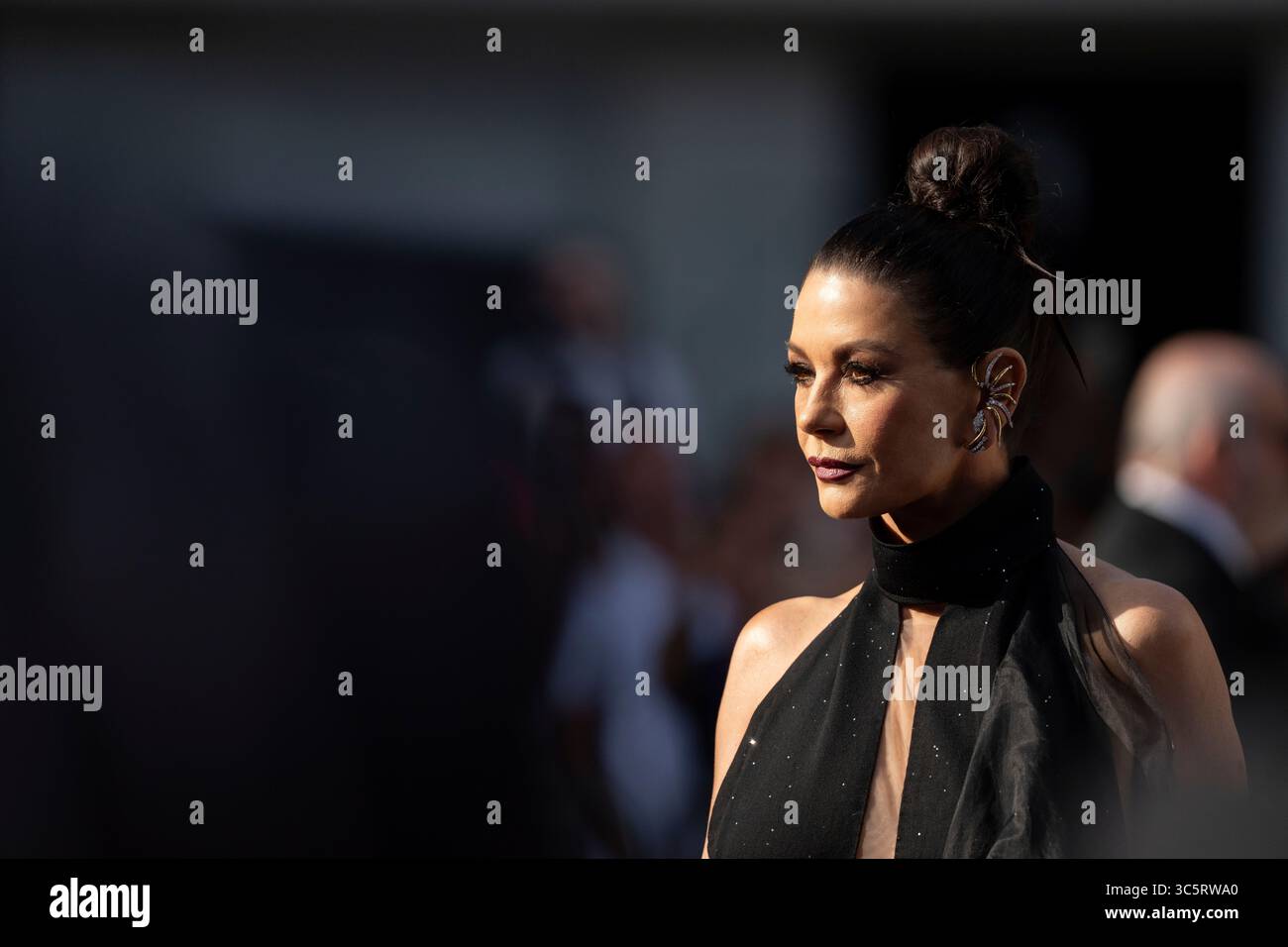 Catherine Zeta-Jones poses for photographers upon arrival at the season ...