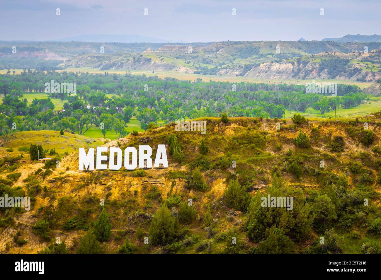 The Medora Hollywood-style sign stands as a recognizable local landmark ...