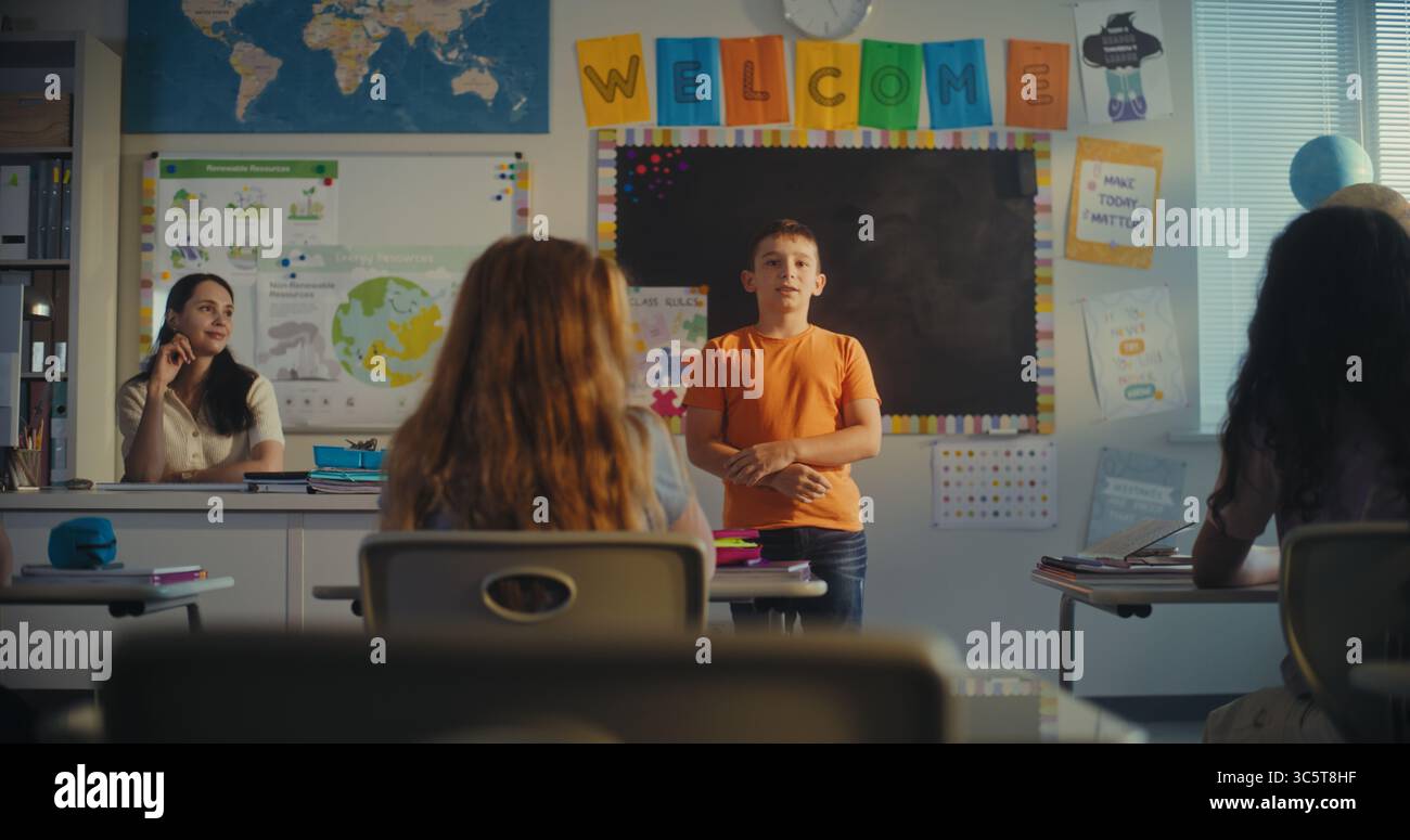 STEM Class on Renewable Energy: Female Teacher Calling Elementary ...