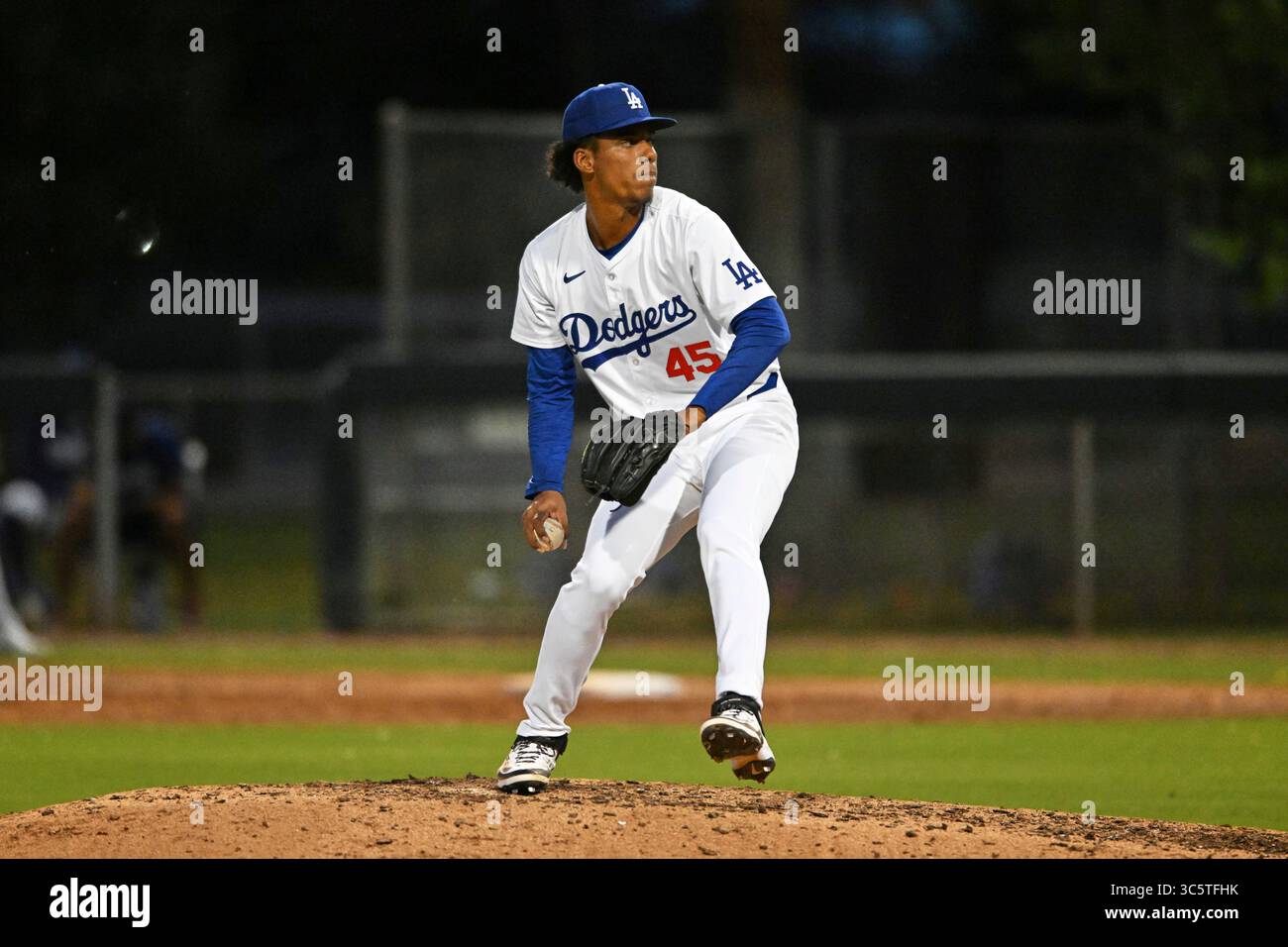 ACL Dodgers pitcher Edgar Leon (45) delivers a pitch during an Arizona ...