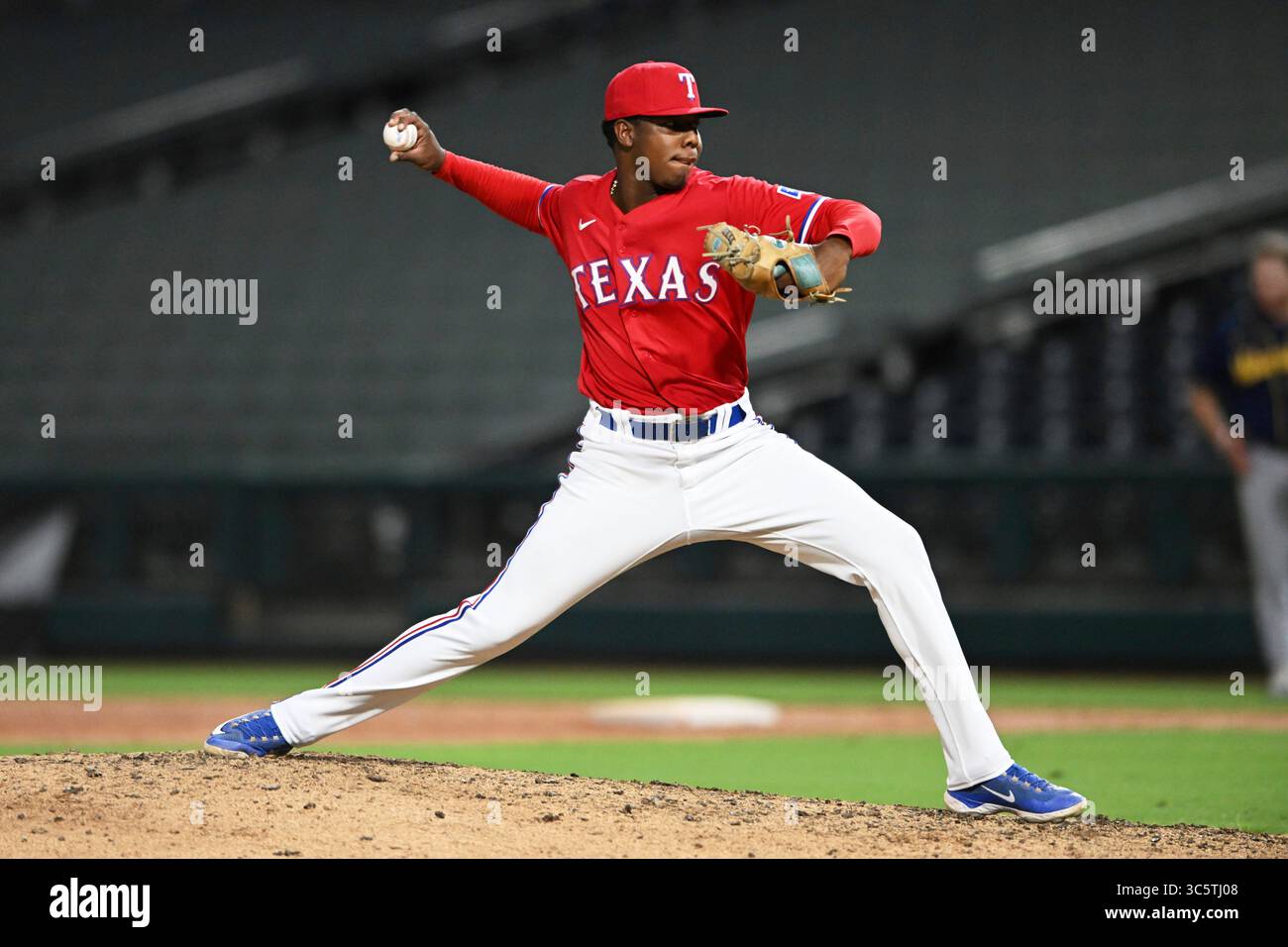 ACL Texas Rangers pitcher Jaiker Garcia (33) delivers a pitch during an ...