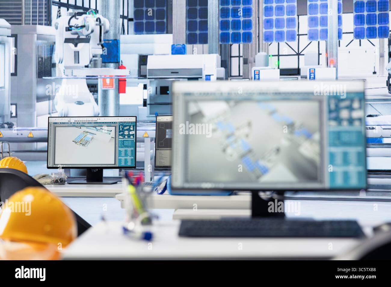 Monitor on desk in photovoltaics hi-res stock photography and images ...