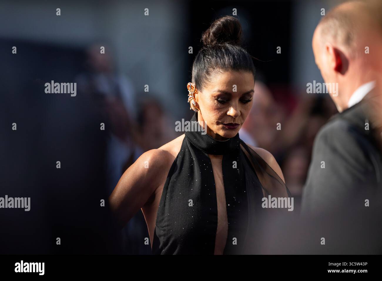 Catherine Zeta-Jones poses for photographers upon arrival at the season ...