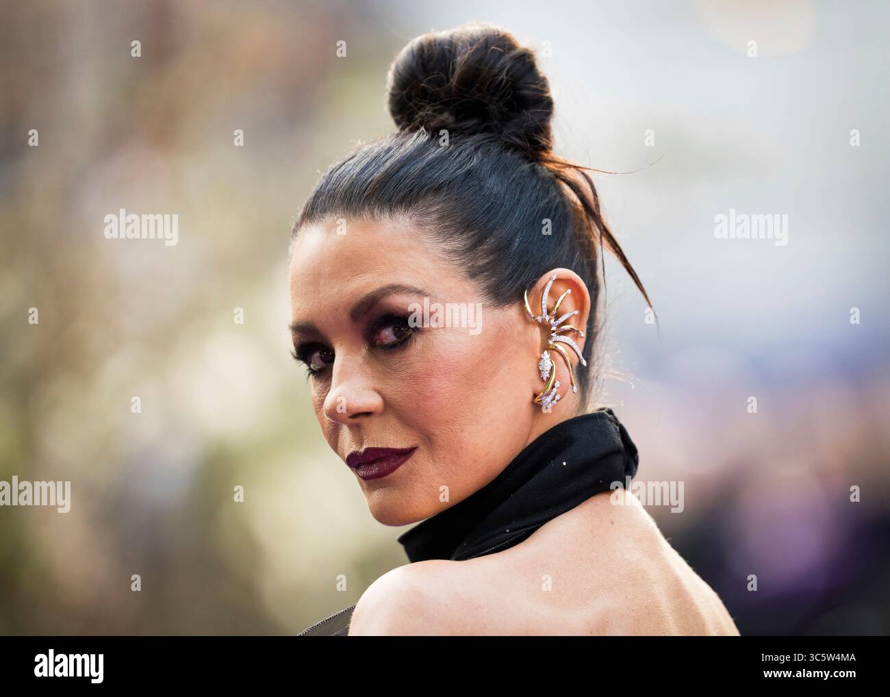 Catherine Zeta-Jones poses for photographers upon arrival at the season ...