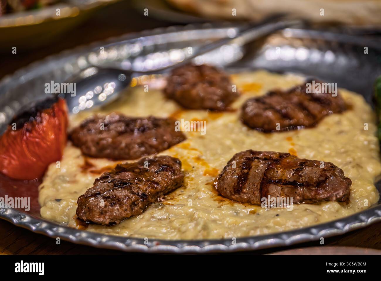 Traditional Turkish cuisine, kofta meatballs with roasted eggplant ...