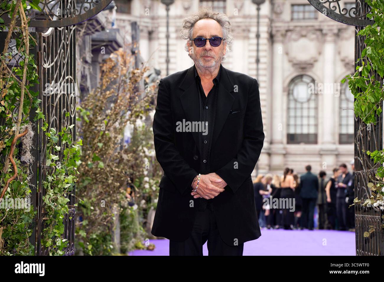 Director Tim Burton poses for photographers upon arrival at the season ...