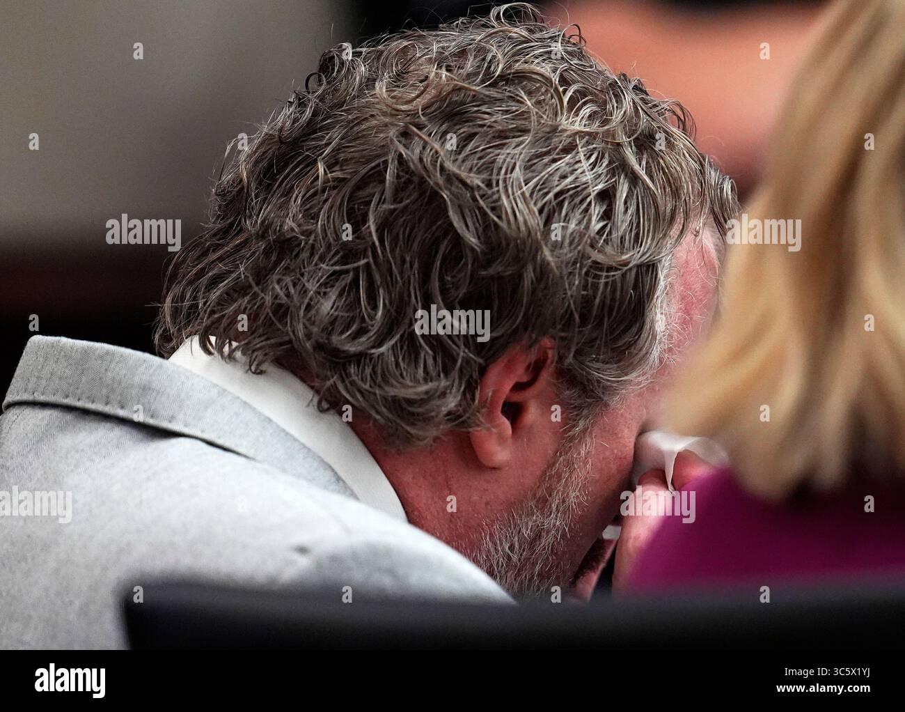 Dentist James Craig wipes his eyes as the verdicts are delivered at his ...