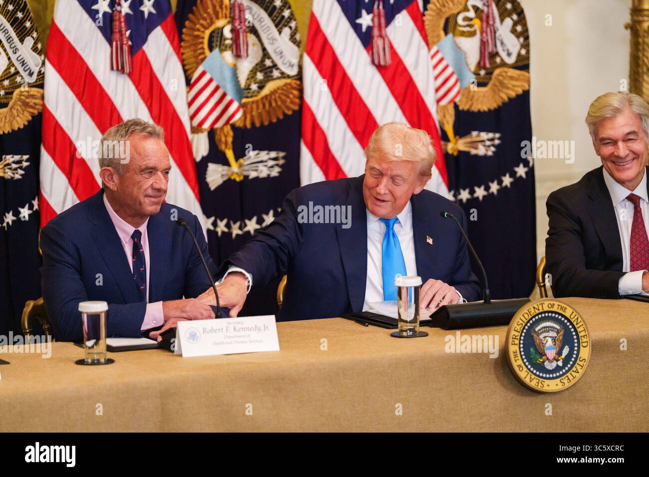 WASHINGTON, USA — July 30 2025: President Donald Trump, alongside ...
