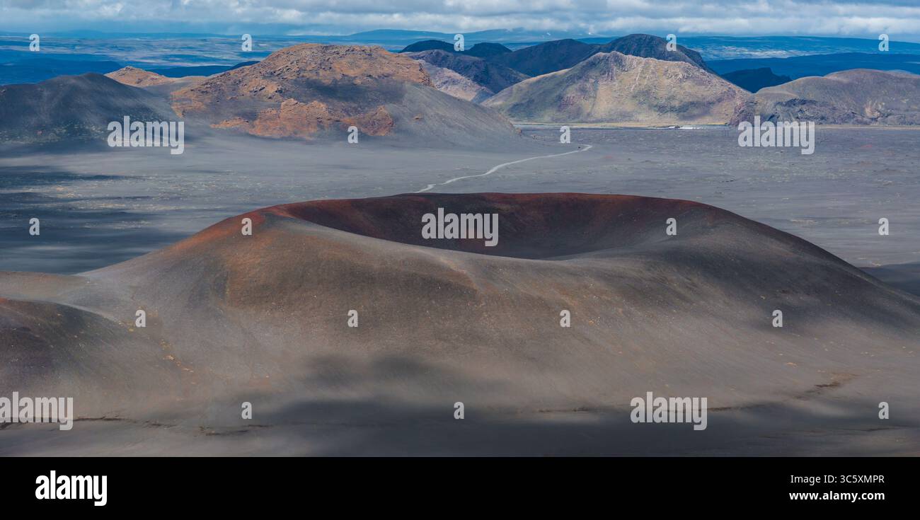 Volcanic Crater and Rugged Mountains in Iceland's Ash Covered Terrain ...