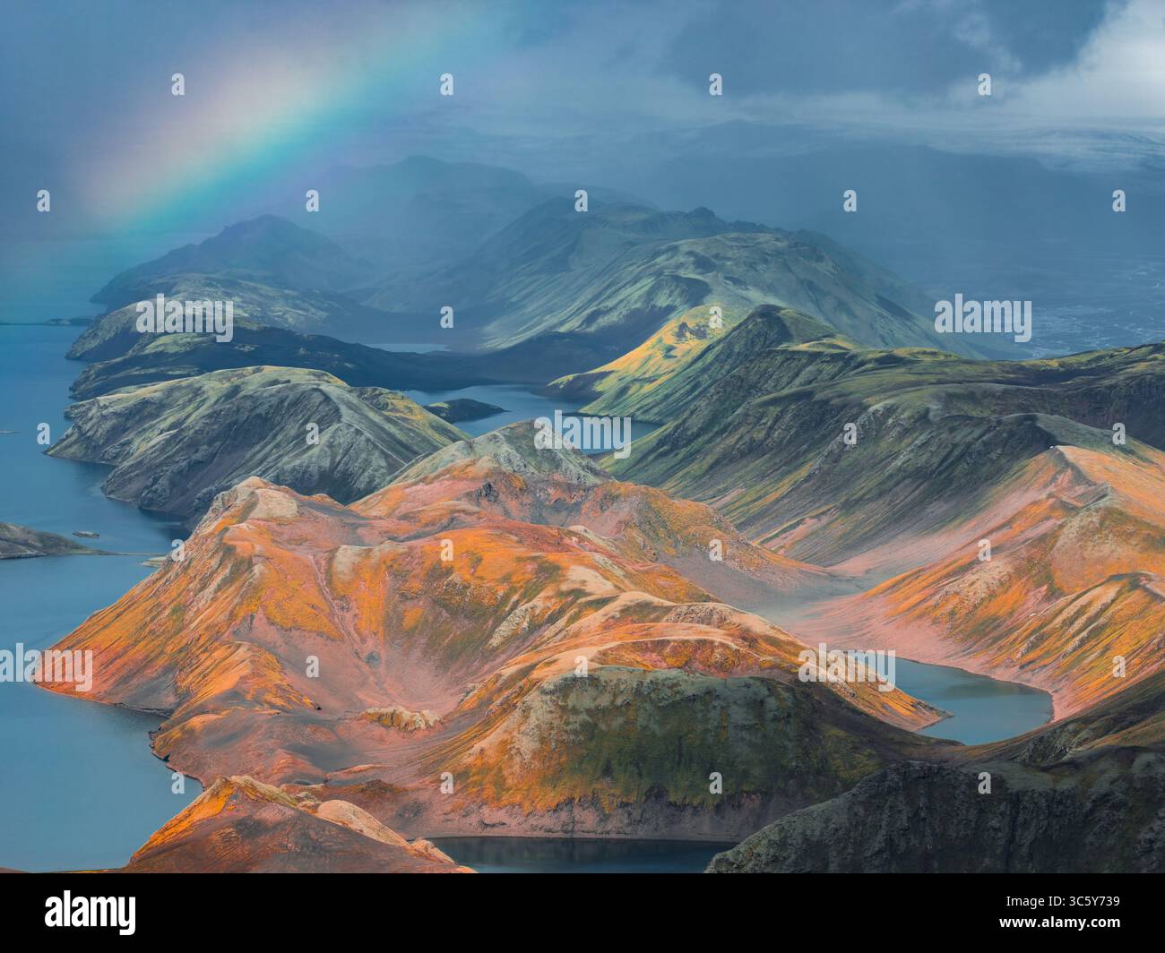 Aerial View of Iceland's Rainbow Mountains with Vibrant Rainbow Stock ...
