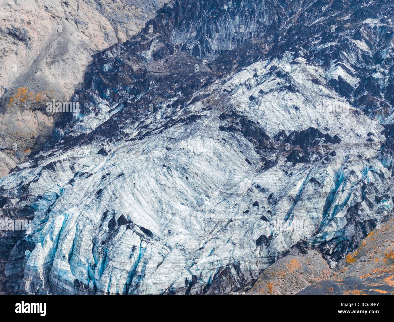 Icelandic Glacier with Volcanic Ash Streaks and Rugged Terrain Stock ...