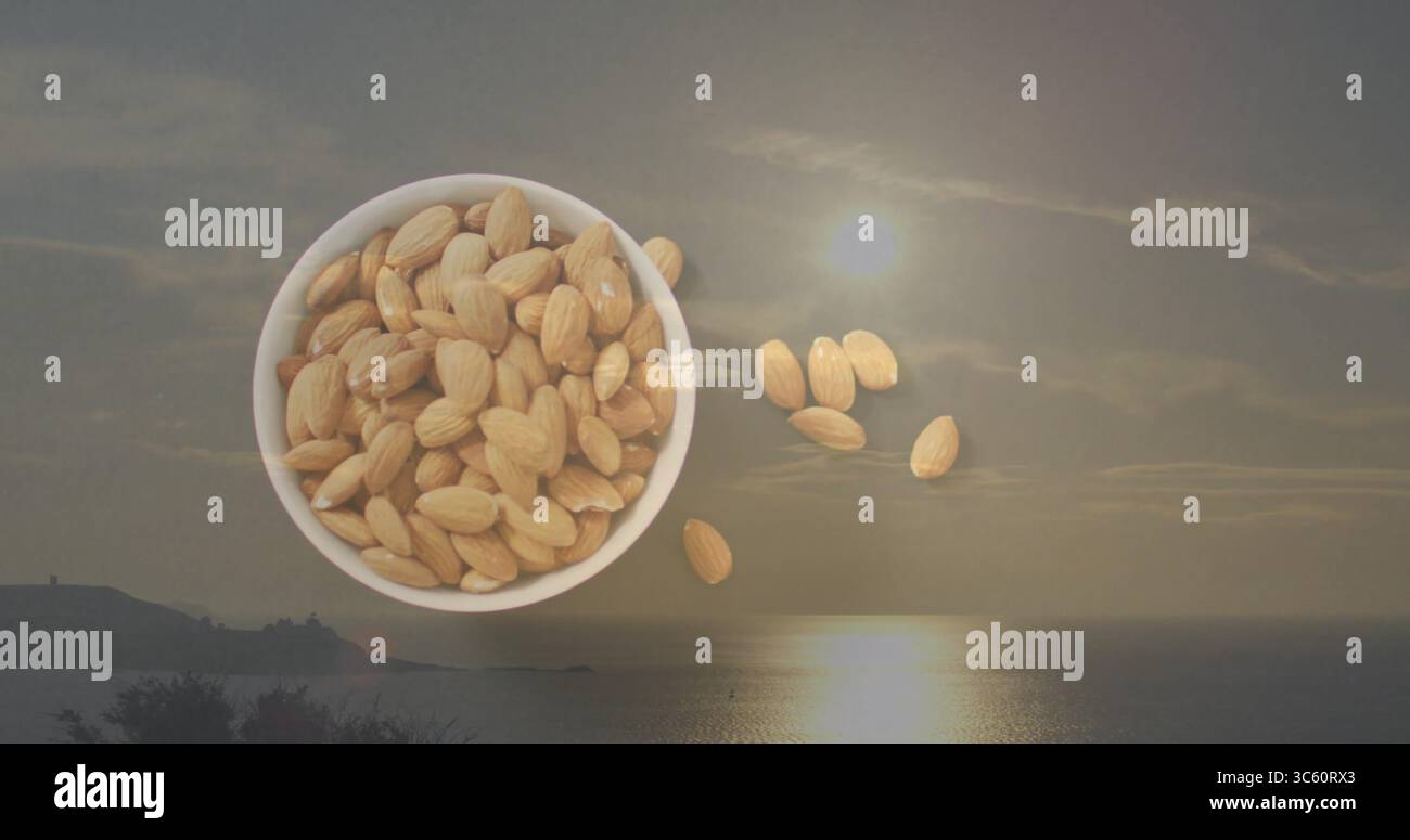 Overflowing white ceramic bowl sitting on shoreline at seaside sunset ...
