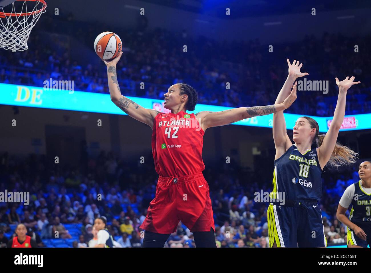 Atlanta Dream center Brittney Griner (42) shoots past Dallas Wings ...