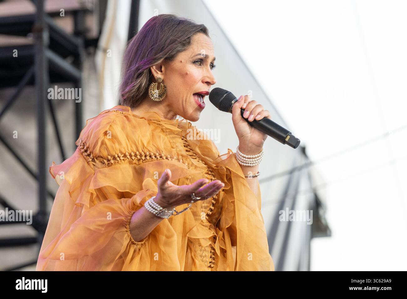 China Forbes performs with Pink Martini band on stage on Rooftop at ...