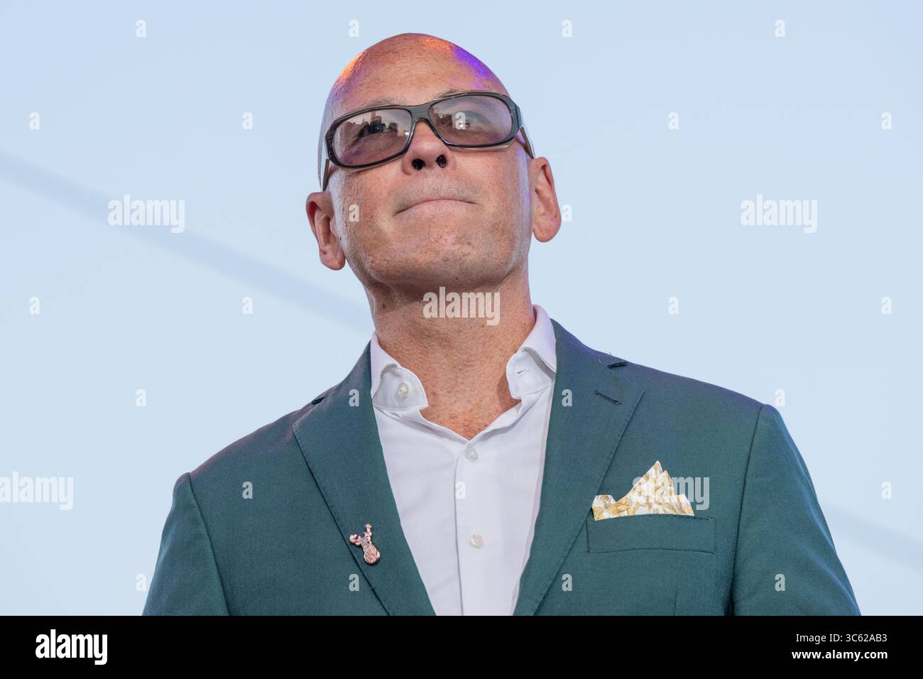 Timothy Nishomoto performs with Pink Martini band on stage on Rooftop ...