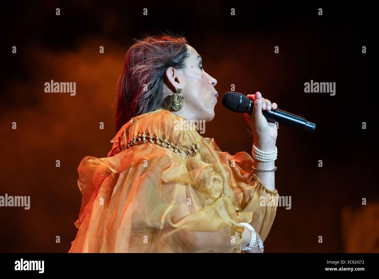 China Forbes performs with Pink Martini band on stage on Rooftop at ...