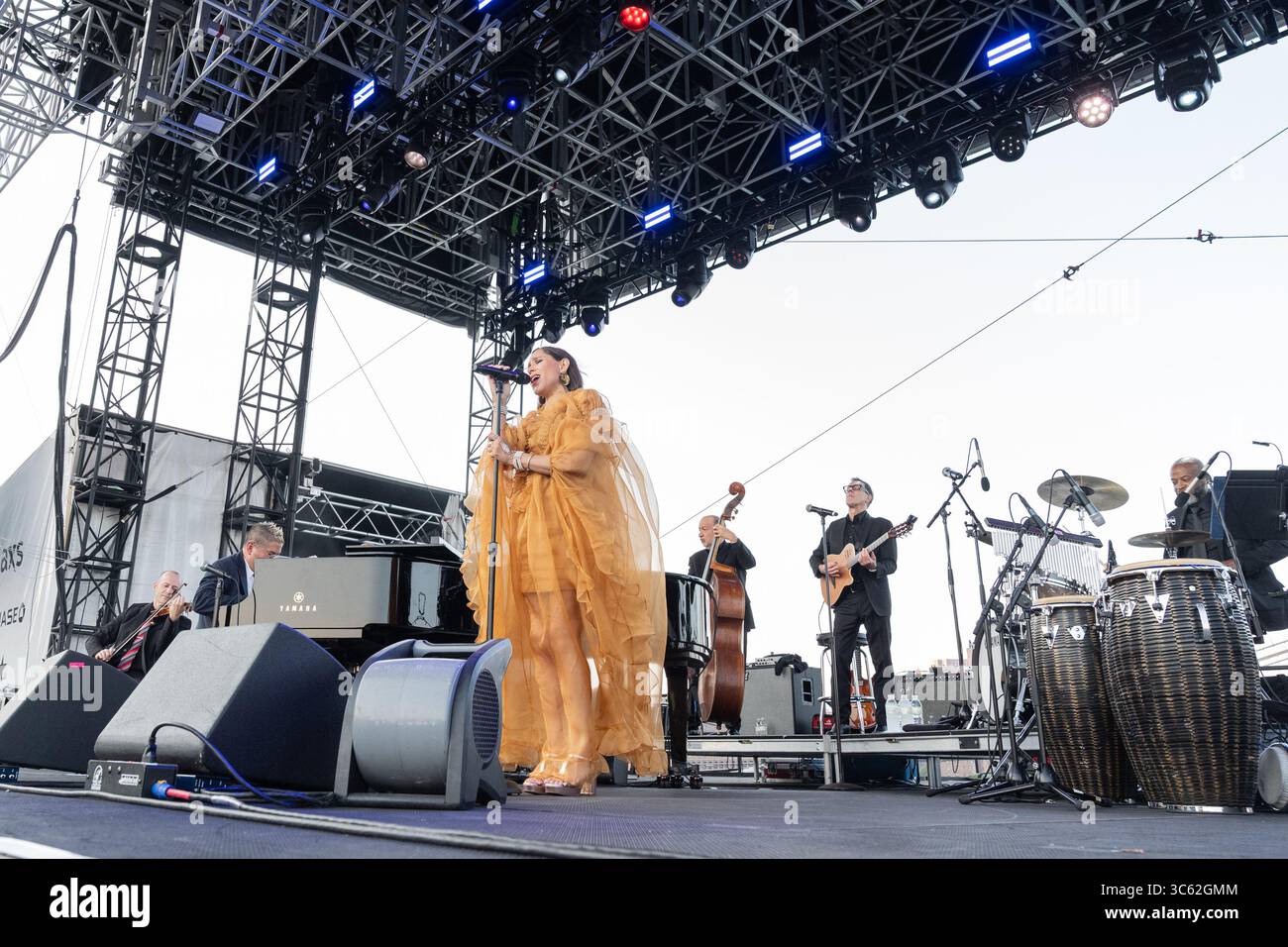 China Forbes performs with Pink Martini band on stage on Rooftop at ...