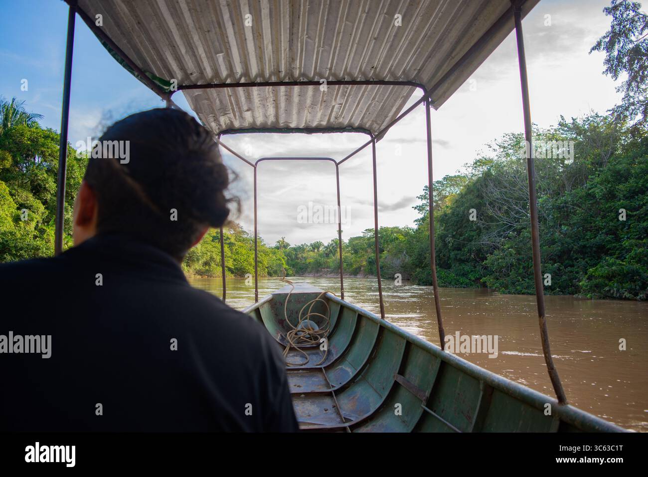 Tranquil boat ride along lush hi-res stock photography and images - Alamy